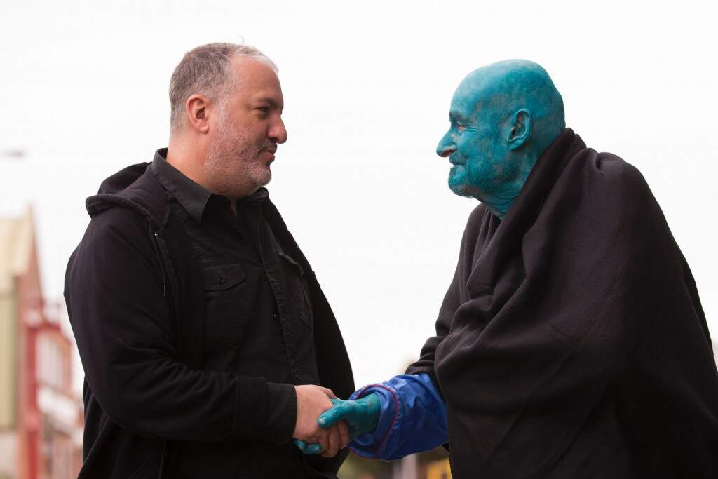 Paint it blue: Thousands strip and paint themselves blue in UK for art
