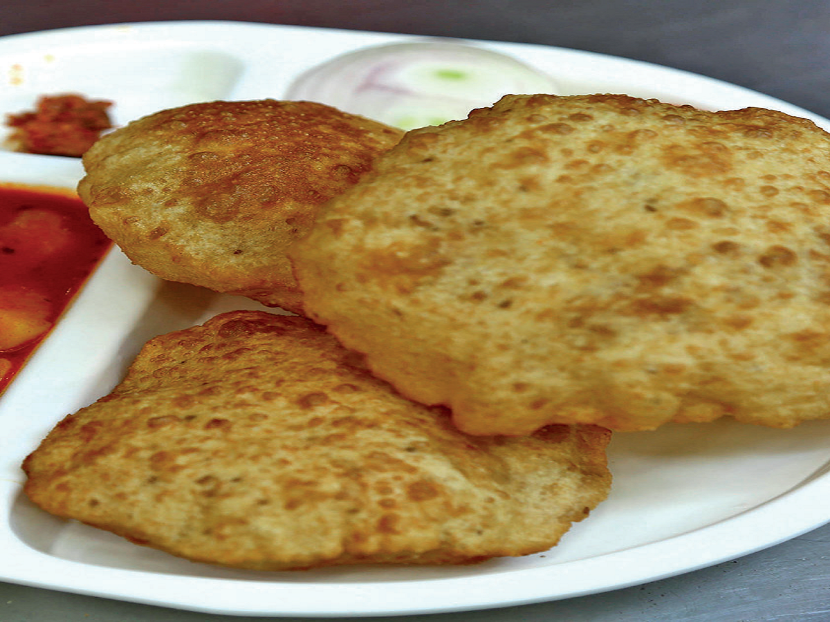 One of India’s favourite breakfast or snack, the poori sabzi is found ...