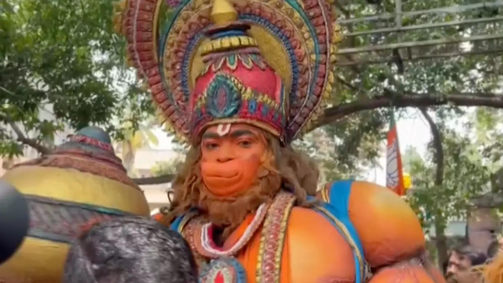A man dressed up as Lord Hanuman attends PM Modi’s roadshow in Bengaluru