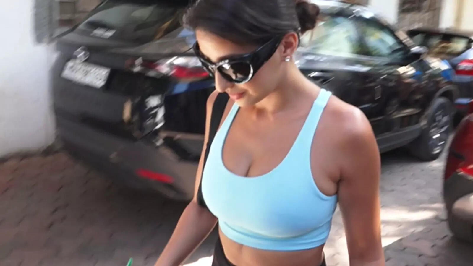 Nora Fatehi gets papped in Bandra, flaunts her washboard abs in sports bra and leggings