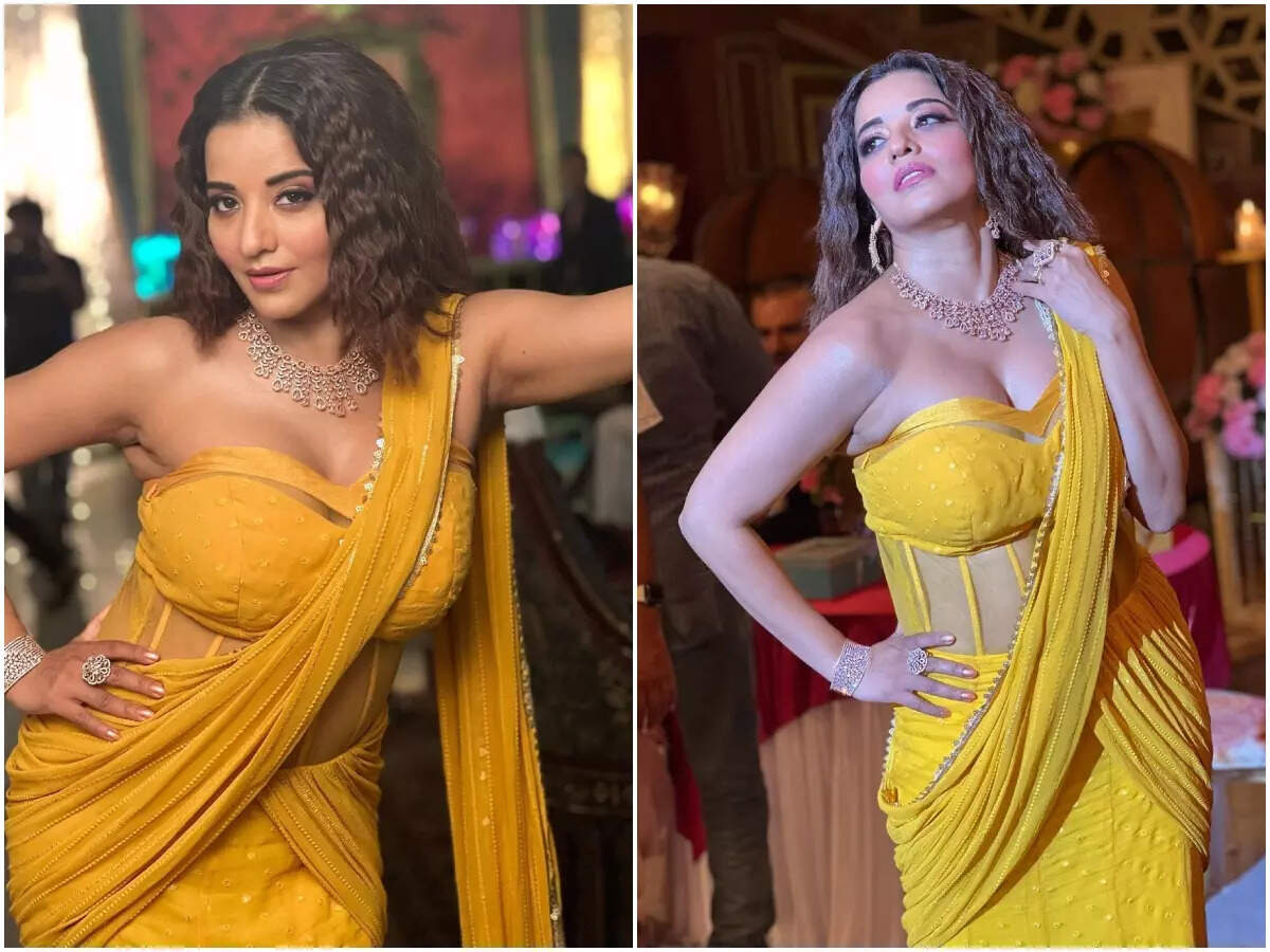Monalisa shows her beauty in a stylish yellow saree