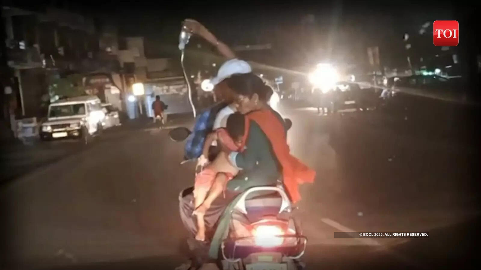 Shocking clips! Child with drip and bottle on two wheeler