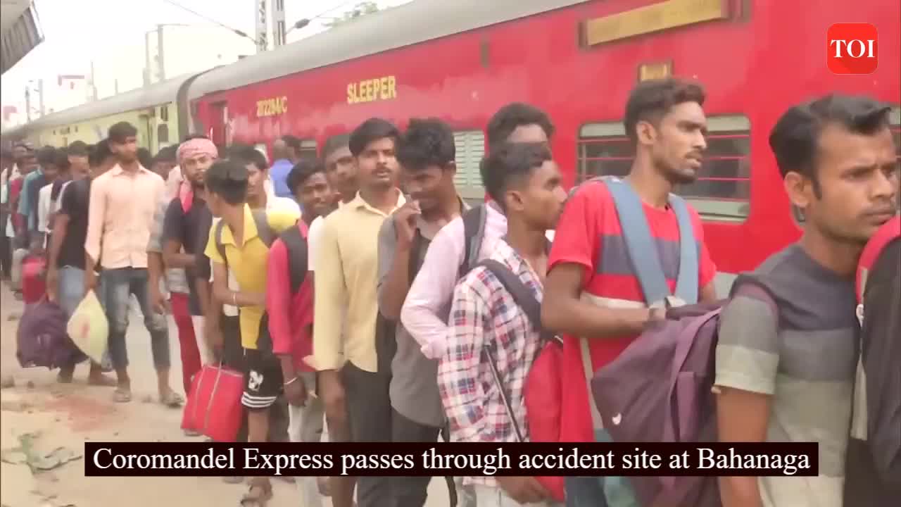Coromandel Express passes through accident site at Bahanaga