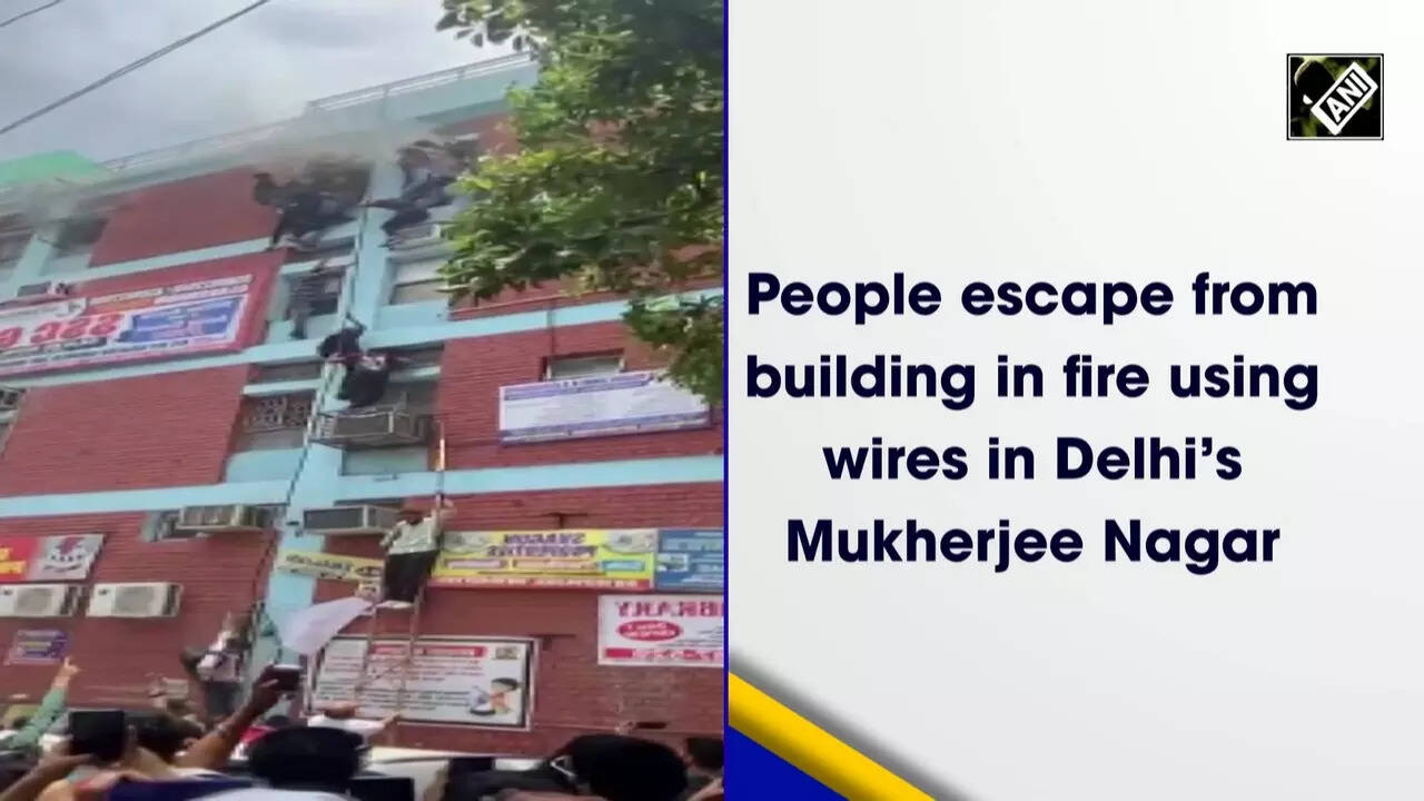 Watch: People escape from building in fire using wires in Delhi’s ...