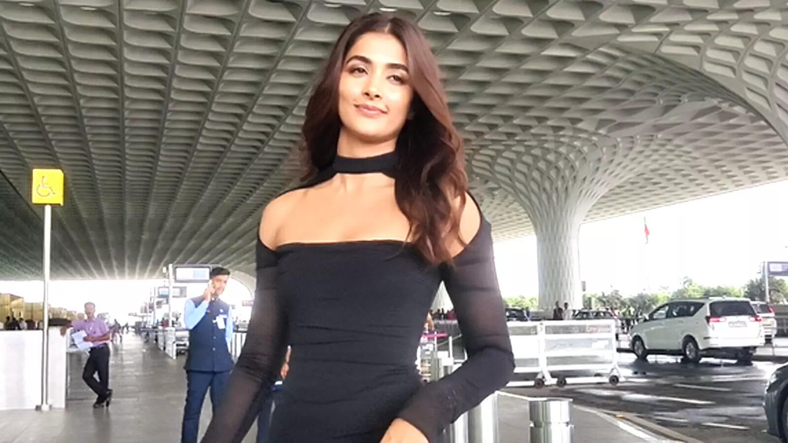 Pooja Hegde makes heads turn at airport in a black bodycon dress