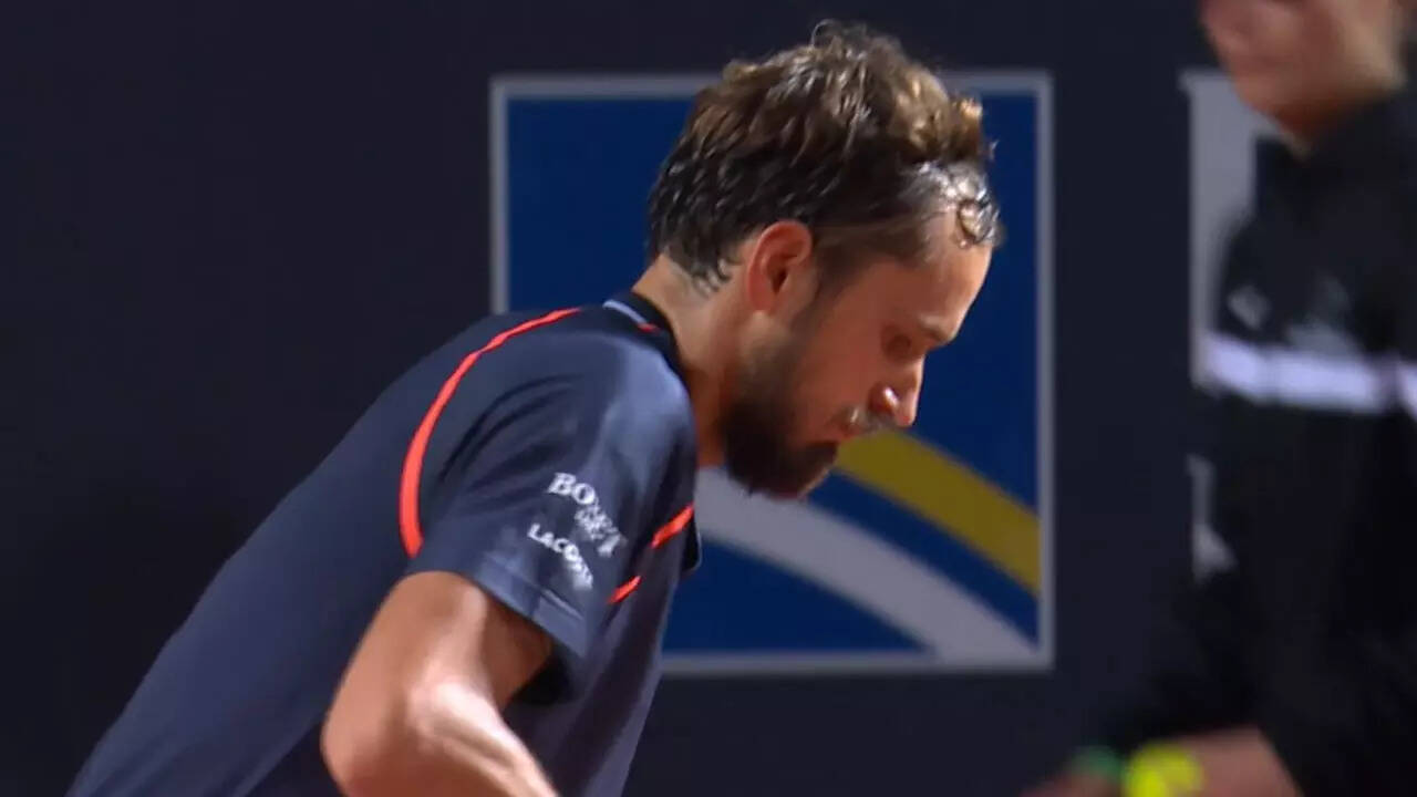 Daniil Medvedev dances after winning match point against Stefanos Tsitsipas