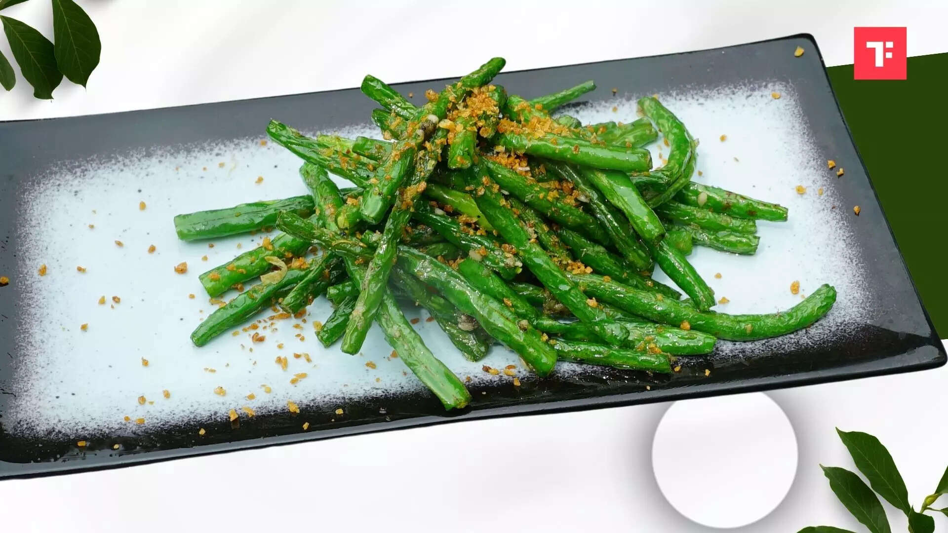 Watch: How to make Garlic Beans - Times Food