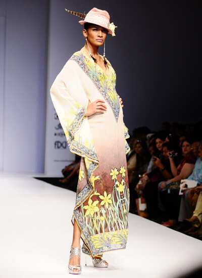 A model poses on the runway in a creation designed by Rajdeep Ranawat ...