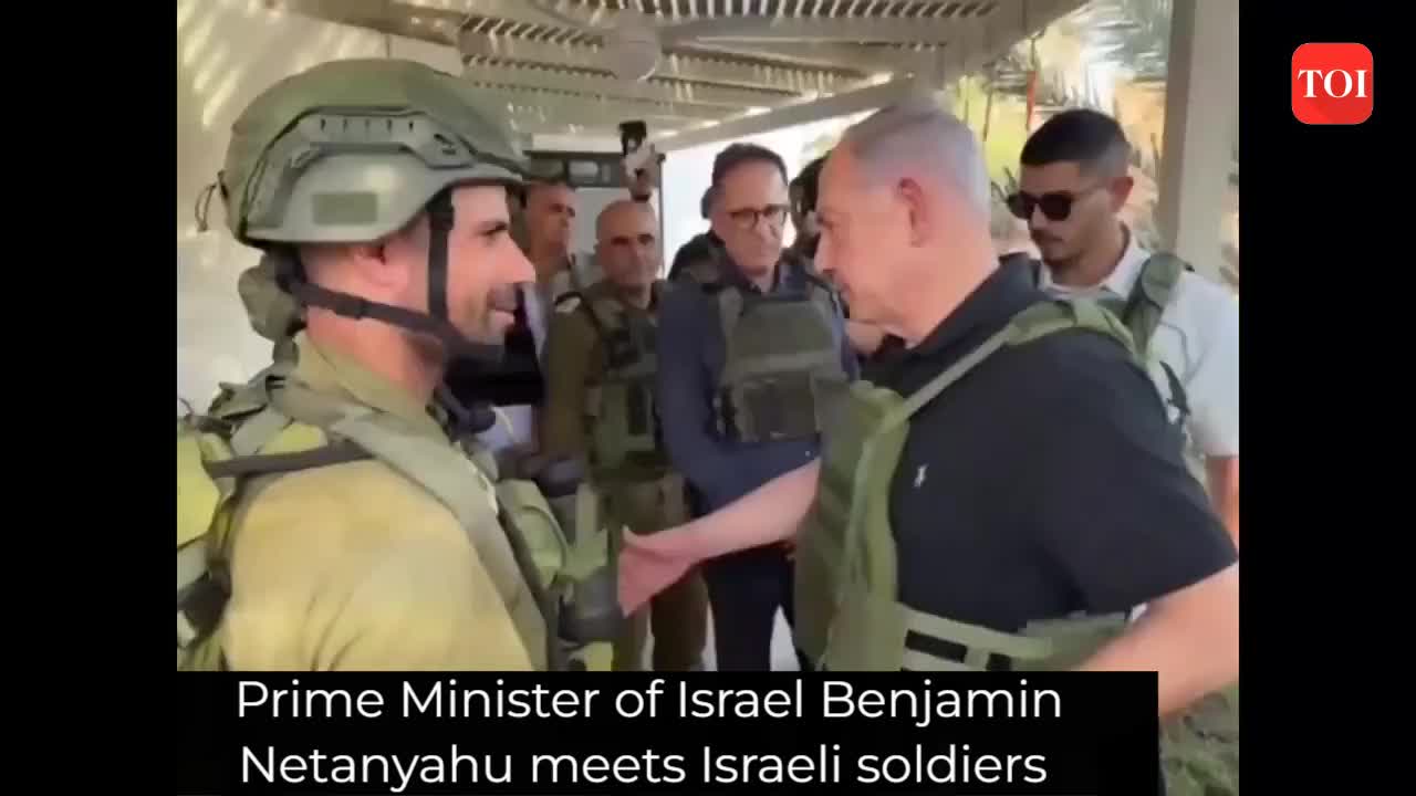 Israel PM Benjamin Netanyahu meets Israeli soldiers at the front