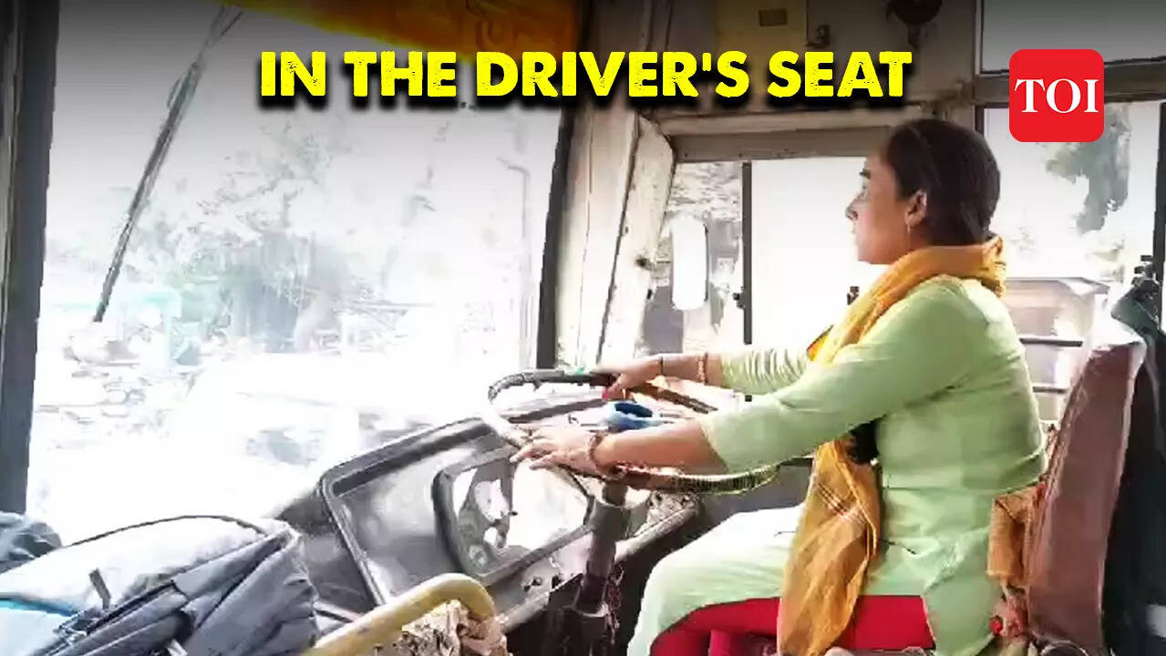 Woman takes up job as bus driver in UP roadways, husband assists her as ...