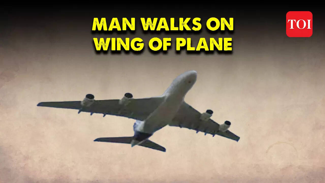 'He Saved Our Lives': Man opens emergency exit, walks on parked plane's ...