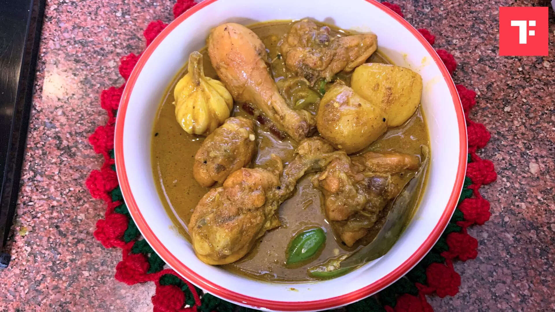 Watch: How to make Whole Garlic Bengali Chicken Curry - Times Food