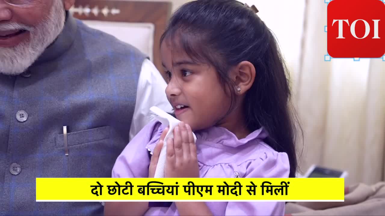 Who are the two lovely granddaughters who met PM Modi?