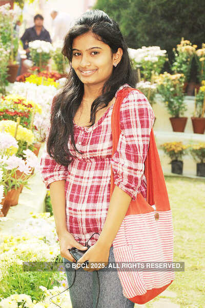 Pooja Kathote during a flower show held at Hislop College's garden area ...