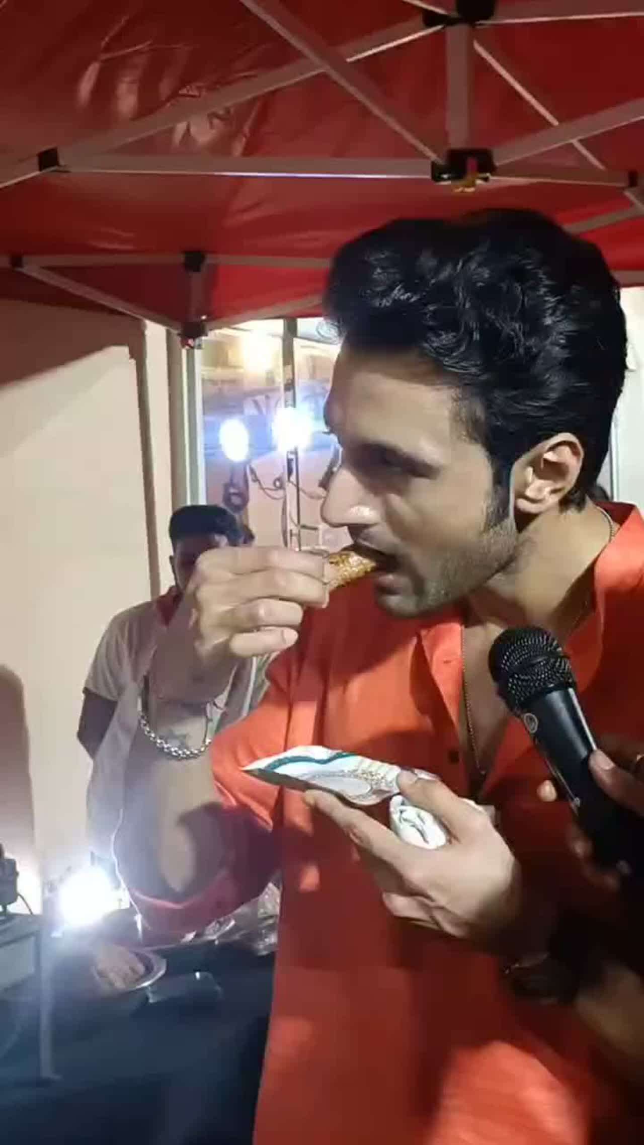 Sean Banerjee relishes some delicious food at a city event