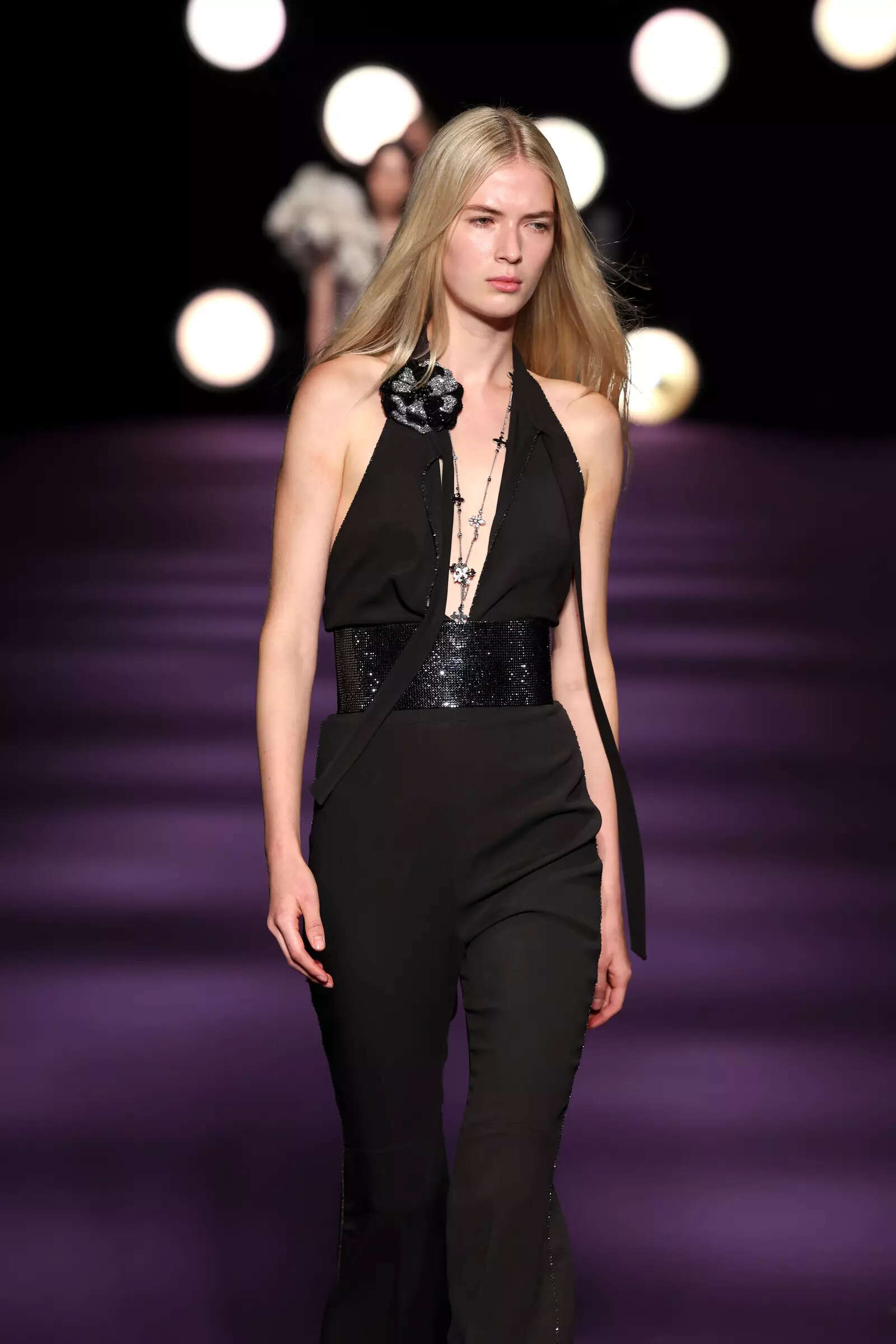 Why is walking on the ramp called a ‘Catwalk’?