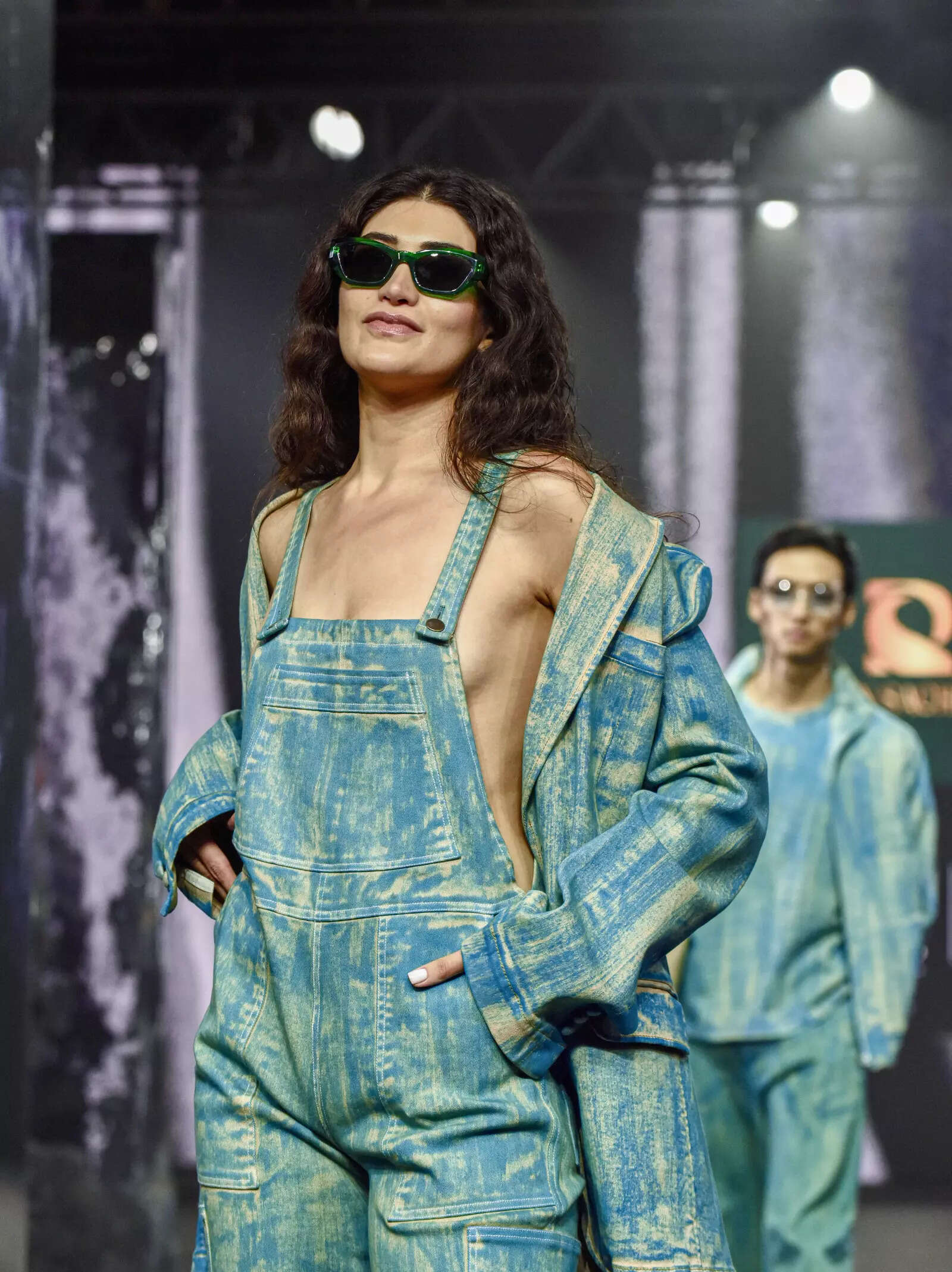 Why is walking on the ramp called a ‘Catwalk’?