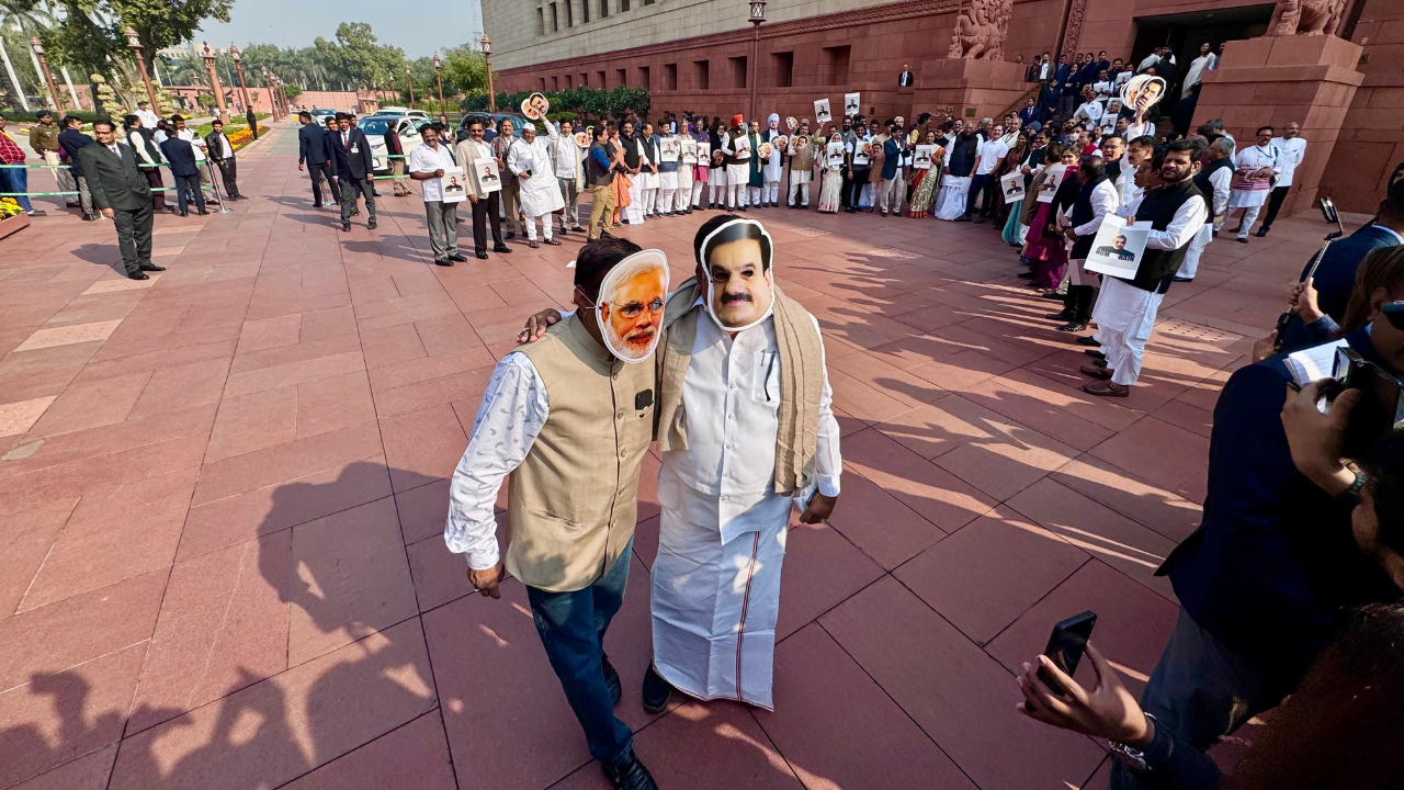 'Modi, Adani ek hain': Rahul Gandhi leads 'mask protest' outside Parliament