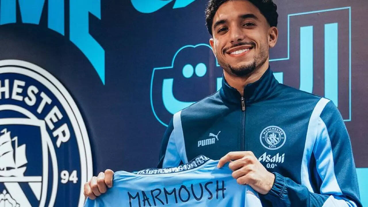 Manchester City sign forward Omar Marmoush from…