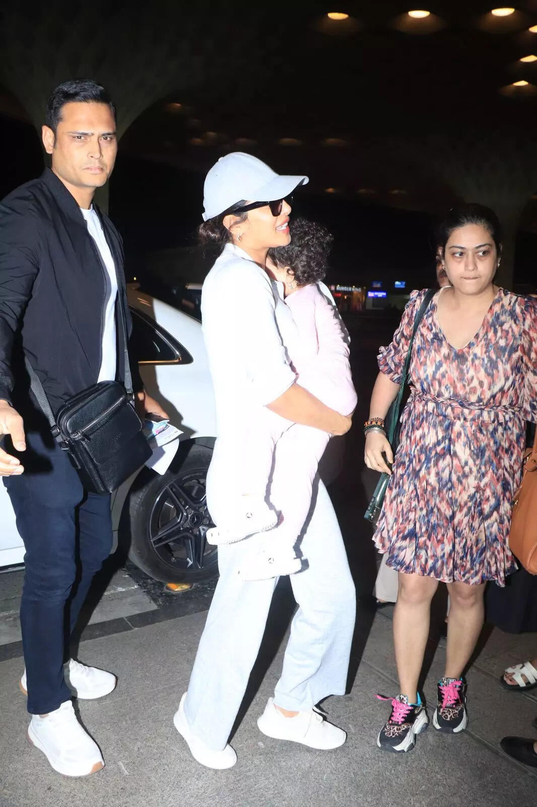 Priyanka Chopra cradles sleeping Malti Marie as they…