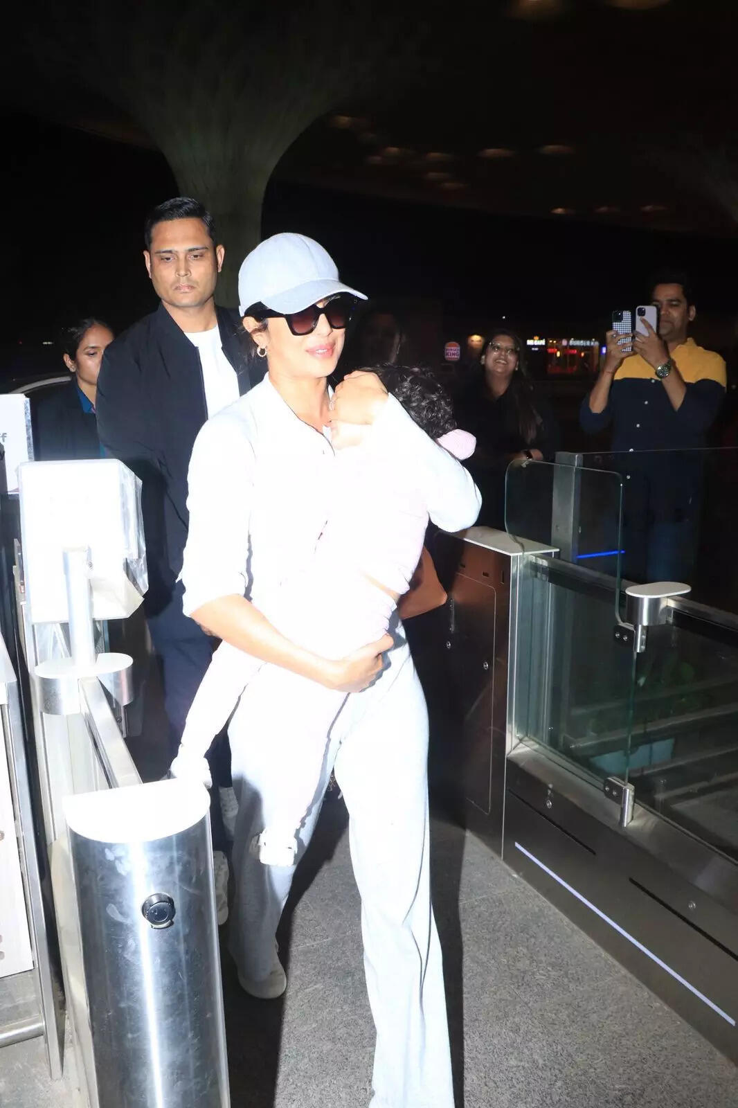 Priyanka Chopra cradles sleeping Malti Marie as they…