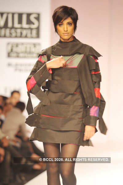 A model showcases a creation by designer Mrinalini at Wills Lifestyle ...