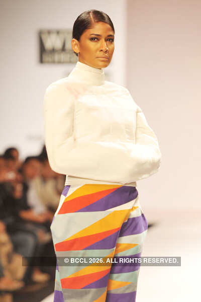 A model showcases a creation by designer Mrinalini at Wills Lifestyle ...