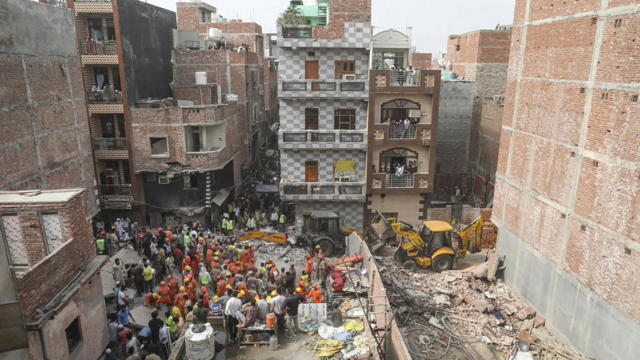 'Pancake' collapse of Delhi building in Mustafabad tests rescuers