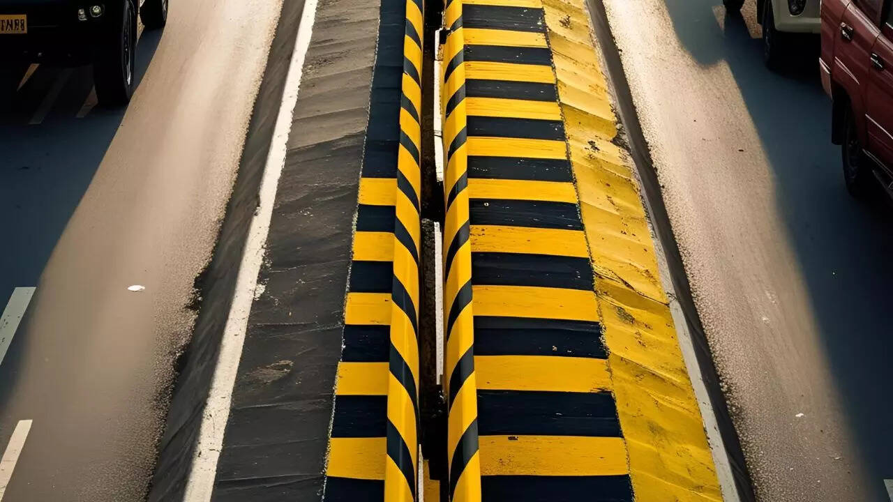 The real reason for black and yellow stripes on road dividers