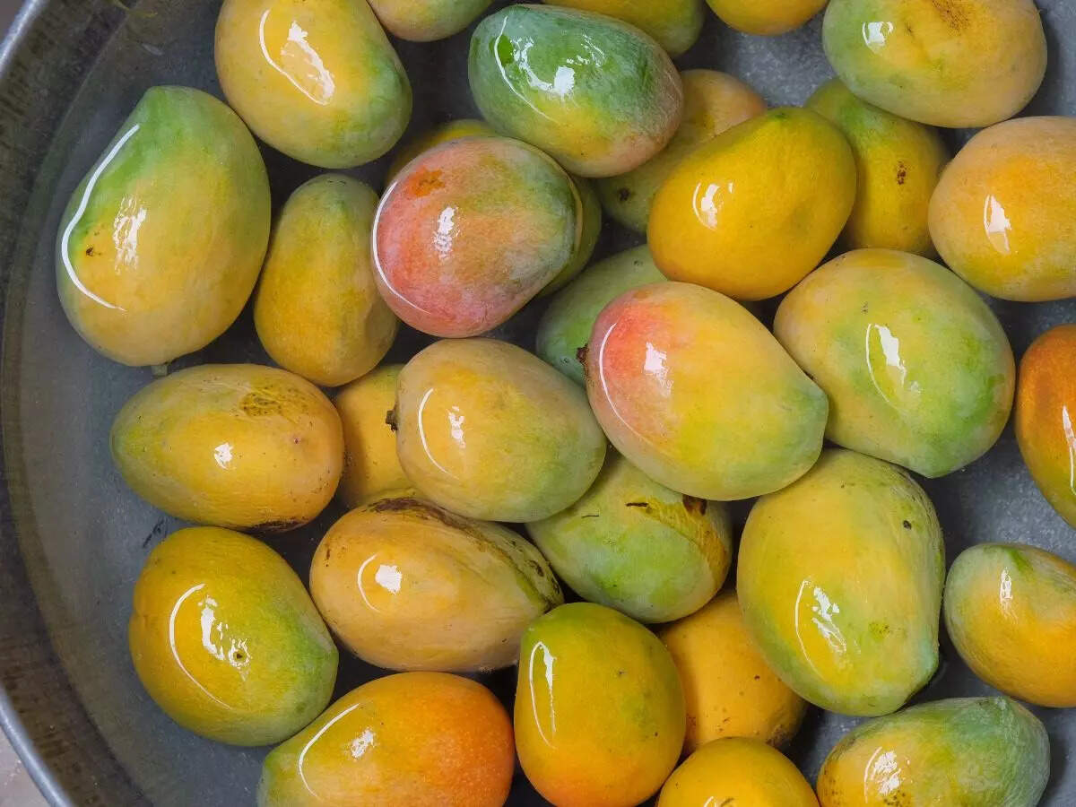Why should you soak mangoes before eating?