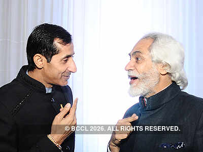 Sheikh Humaid Bin Ali Bin Sultan Al-mani, the Omani ambassador (L) and ...