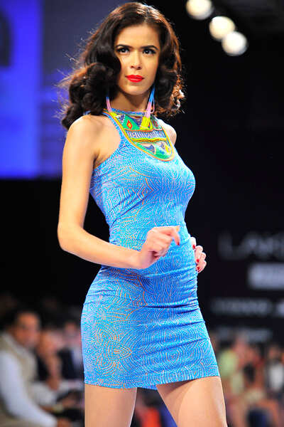 Pia Trivedi showcases a creation by designer Pia Pauro during the Day 1 ...