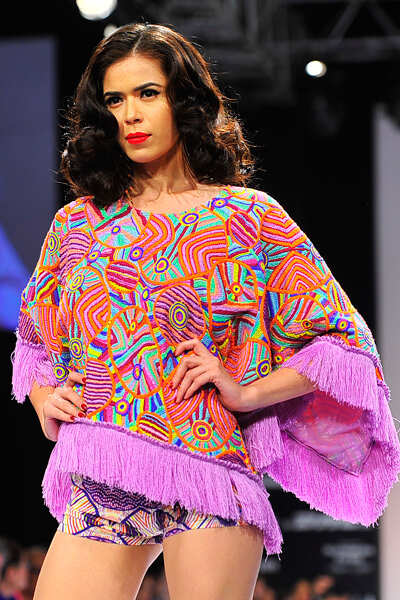 Pia Trivedi showcases a creation by designer Pia Pauro during the Day 1 ...