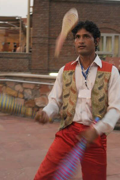 Artist performing an act during the Delhi Magic Festival, held at Dilli ...