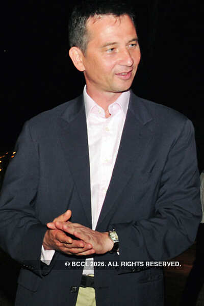 Barry Lowen during a croquet and cocktail party with British designer ...