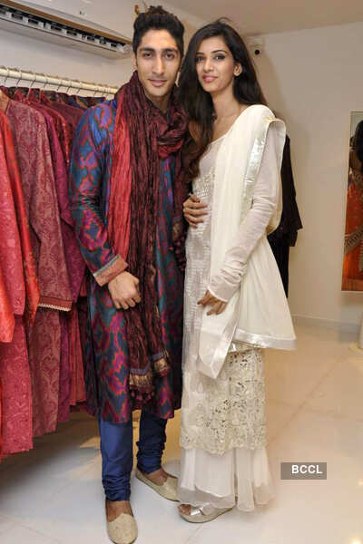 Models showcase creations during designer Krishna Mehta's collection ...