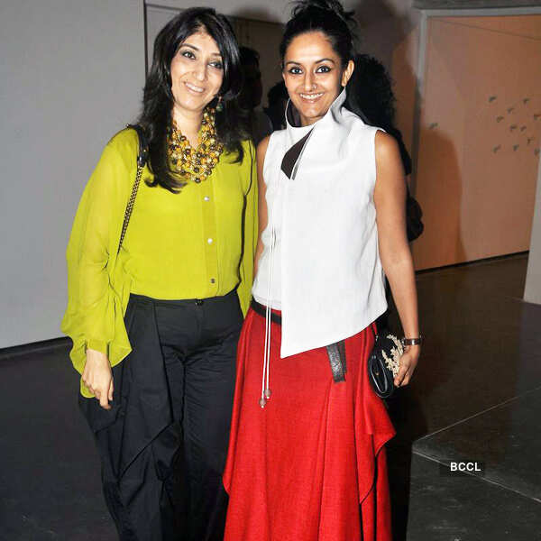 Designer Payal Khandwala (R) enjoys the attention during the preview of ...