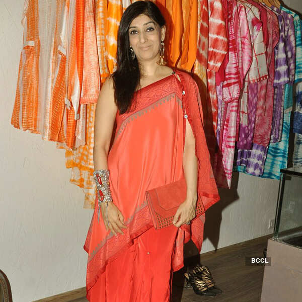 Azmina Rahimtoola in vibrant orange during designer Krishna Mehta's ...