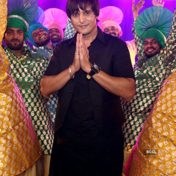 Neha Dhupia and Jimmy Shergill in a still from Punjabi movie Rangeelay