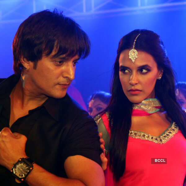 Neha Dhupia and Jimmy Shergill in a still from Punjabi movie Rangeelay