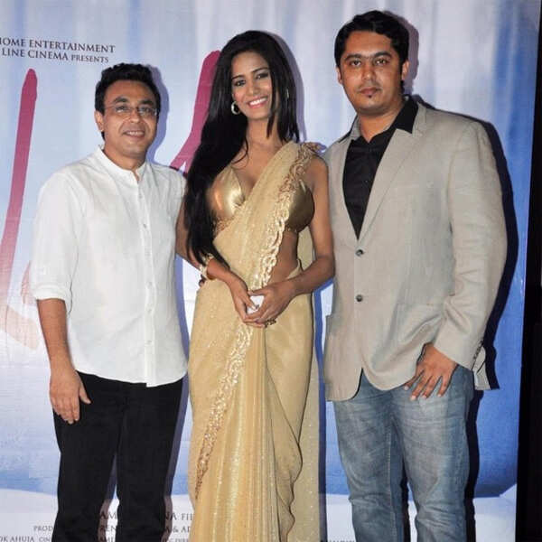 Poonam Pandey with director of the film Amit Saxena (L) during the ...