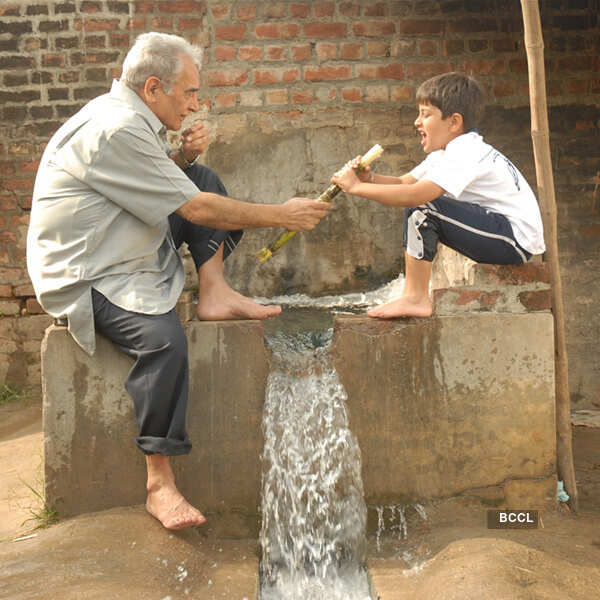Kulbushan Kharbanda and Shrey Bawa in a still from Punjabi movie ...
