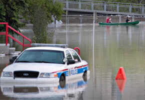 Two dead, thousands evacuated after floods hit Calgary