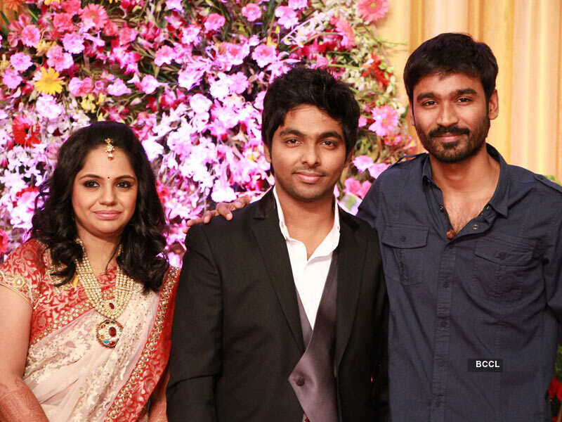 Dhanush poses with the couple during the wedding reception of GV ...