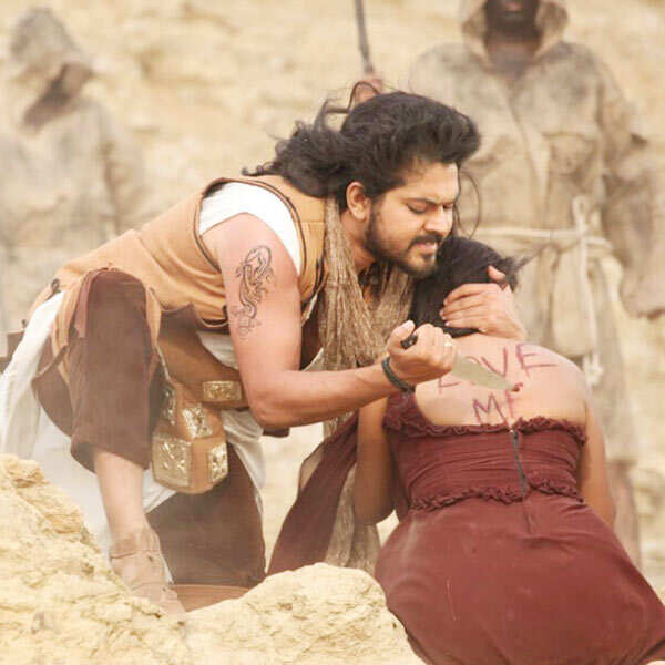 Sakthi Vasu and Poorna in a still from the Tamil movie Padam Pesum