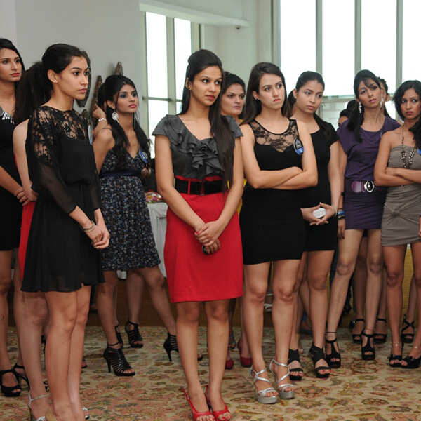 Contestants wait for their turn during the Indian Diva 2013 auditions ...