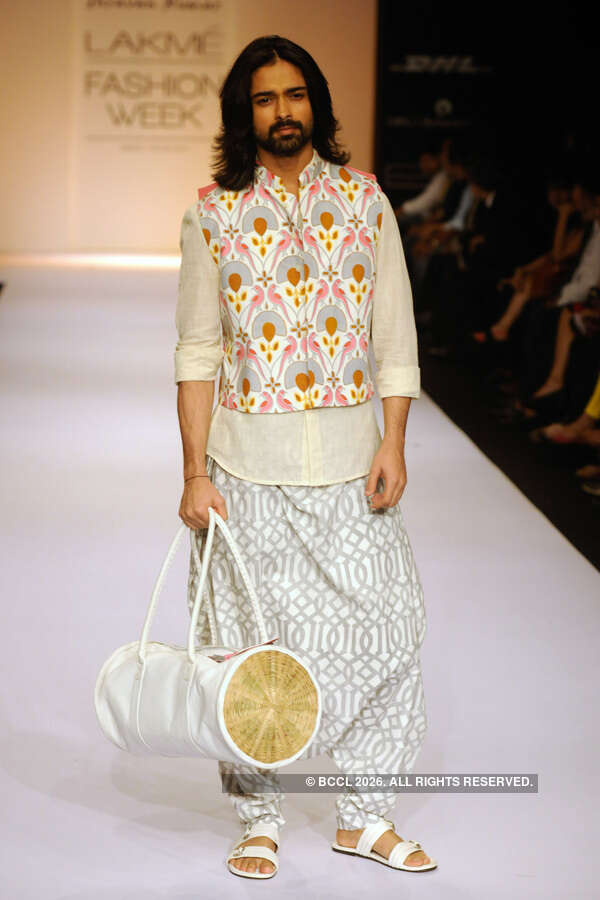 A model showcases a creation by designer Shravan Kumar on Day 5 of the ...