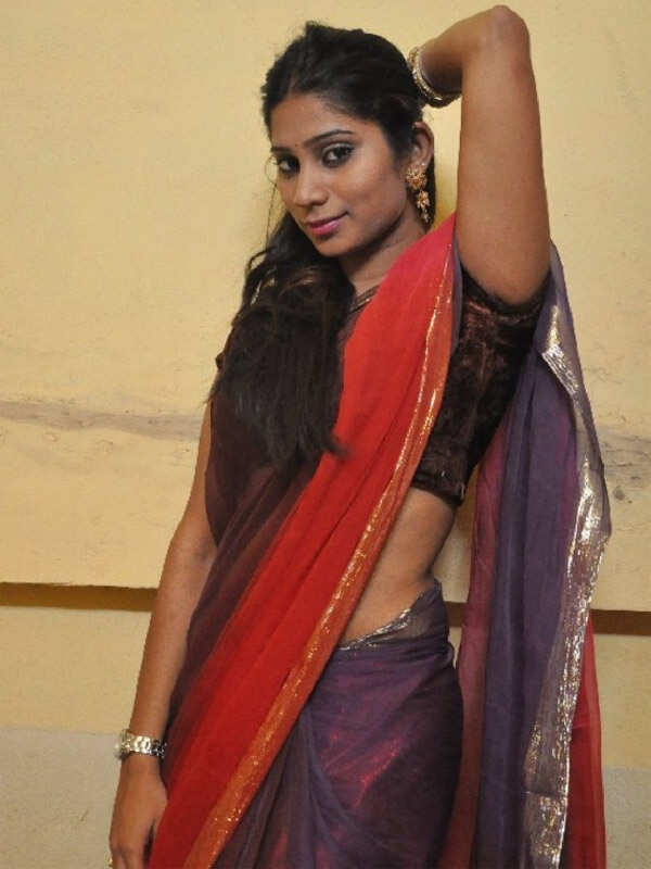 Midhuna looks hot in a saree giving an ample view of her clevage during ...