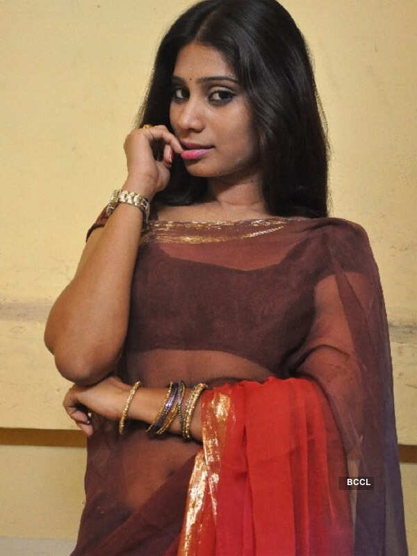 Midhuna looks hot in a saree giving an ample view of her clevage during ...