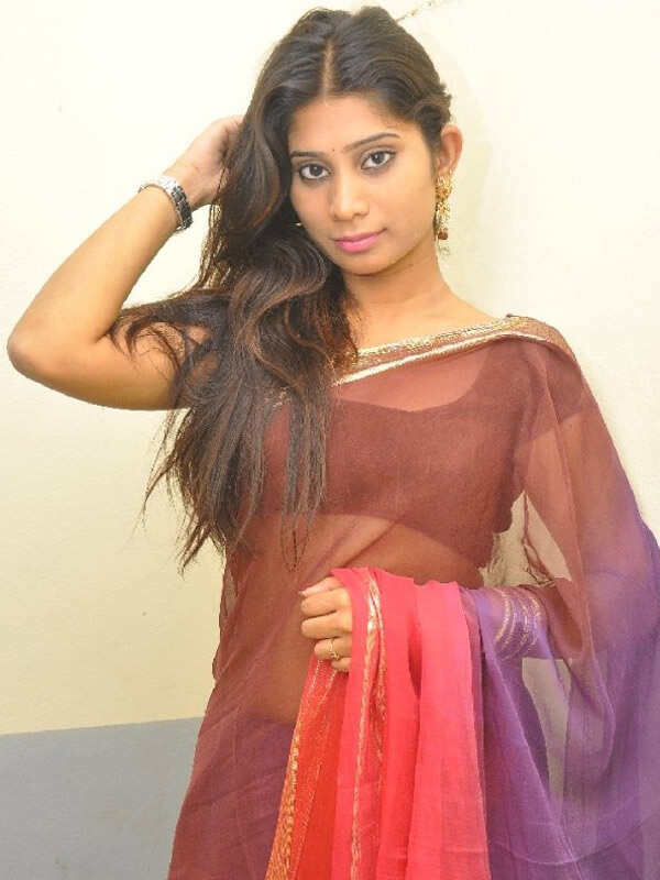 Midhuna looks hot in a saree giving an ample view of her clevage during ...